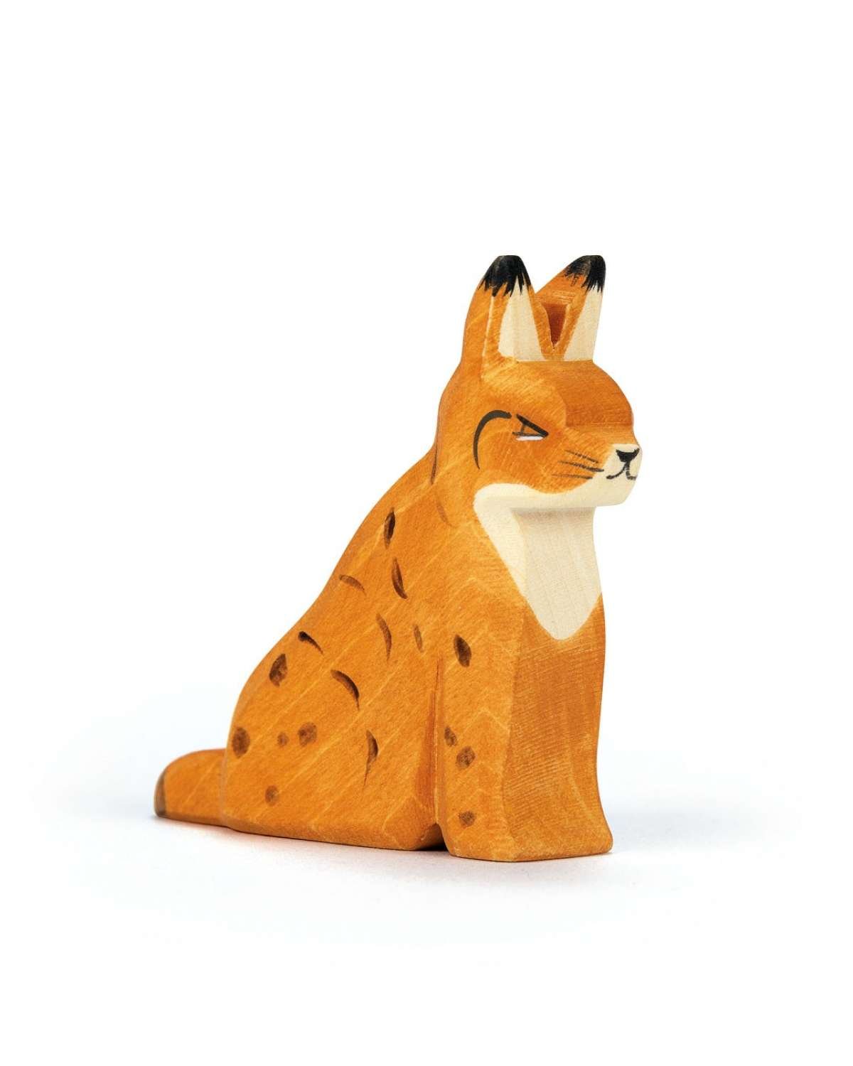 Ostheimer Dyr Trefigurer | Treleker Barn - Gaupe, sitter.